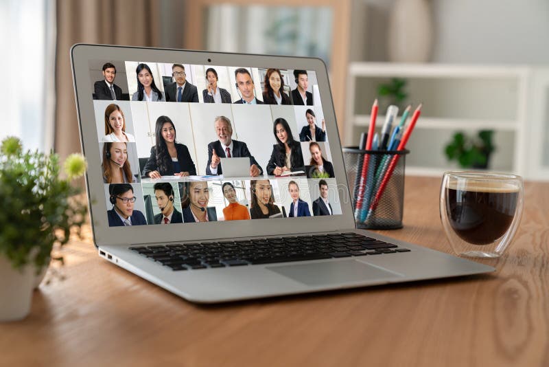 Business People on Video Conference for Modish Virtual Group Meeting ...