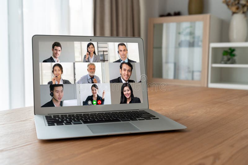Business People on Video Conference for Modish Virtual Group Meeting ...