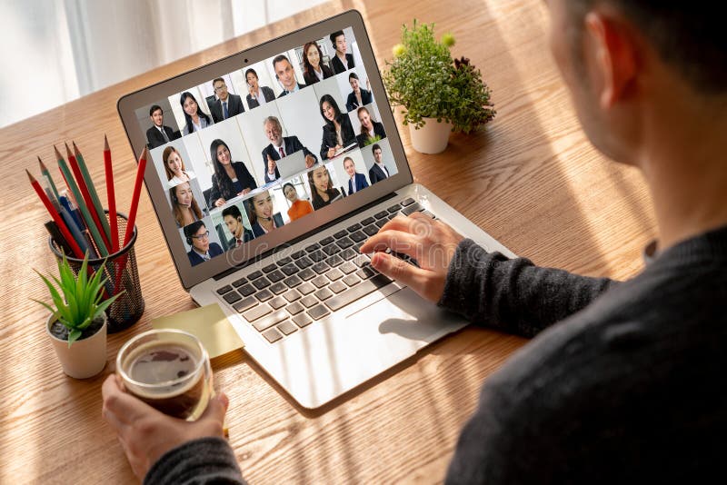 Business People on Video Conference for Modish Virtual Group Meeting ...