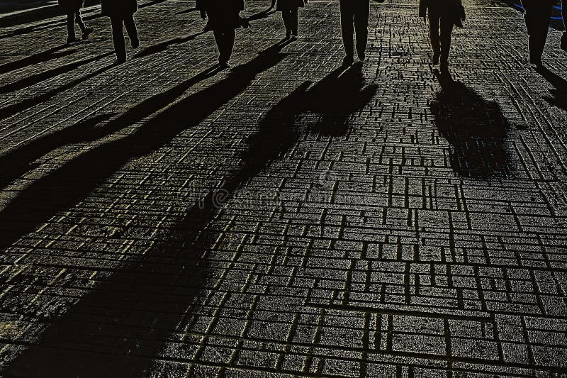 Business People Walking and Casting Long Shadows on Pavement Stock ...
