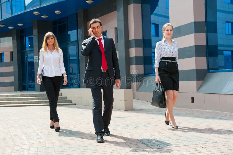 Business people walking i stock photo. Image of downtown - 20358912