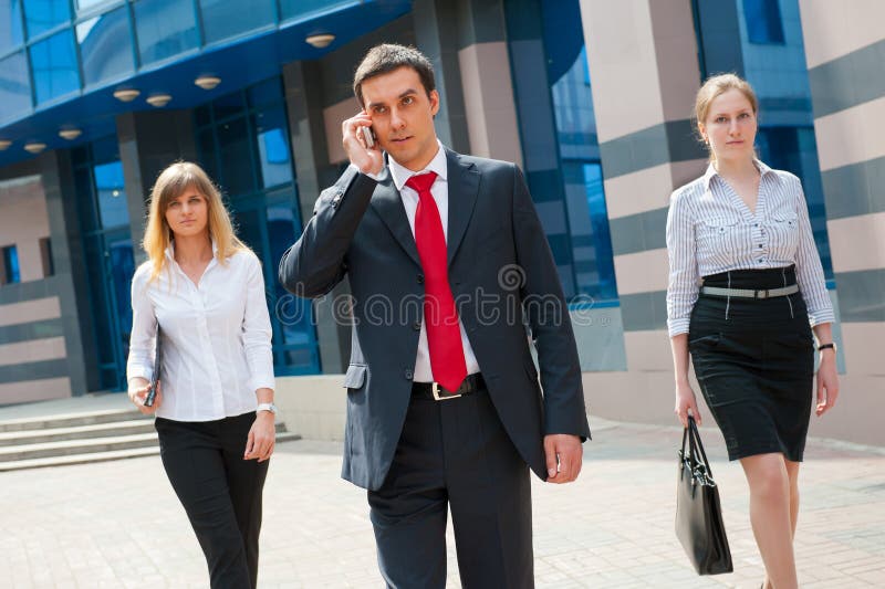 Business people walking i stock photo. Image of downtown - 20358912