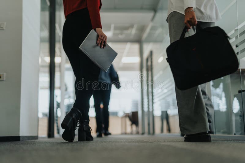 Business People Walking through Modern Office Hallway Stock Photo ...
