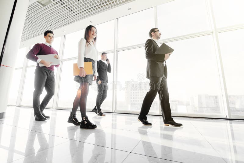 Business People Walking in the Office Corridor. Walk Team. Stock Image ...
