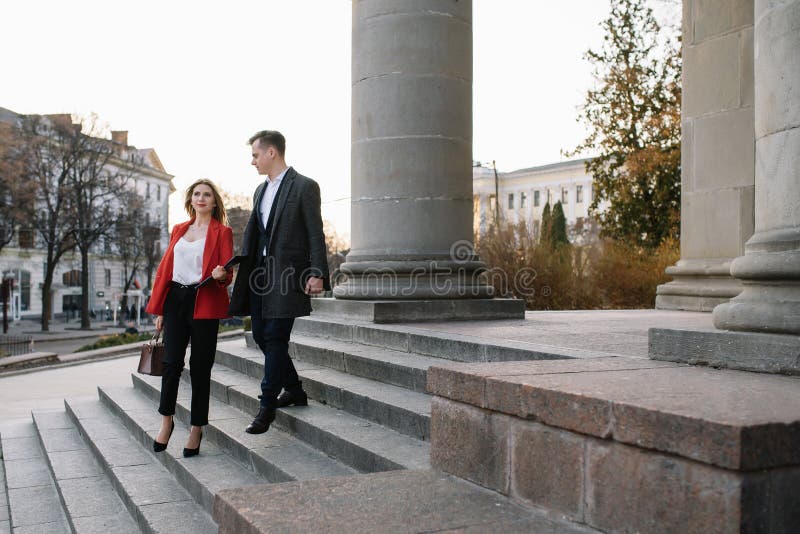 Business People Walking and Talking in the Street Stock Image - Image ...