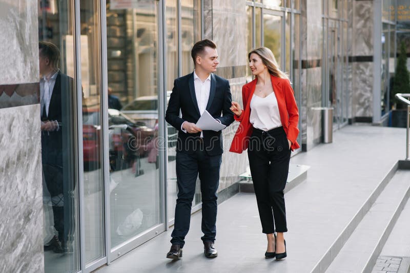Business People Walking and Talking in the Street Stock Photo - Image ...