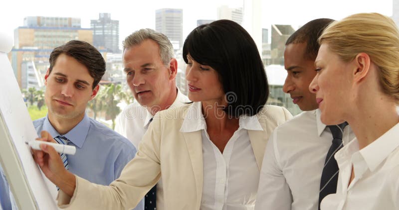 Business People Watching Woman Write Something Stock Footage - Video of ...