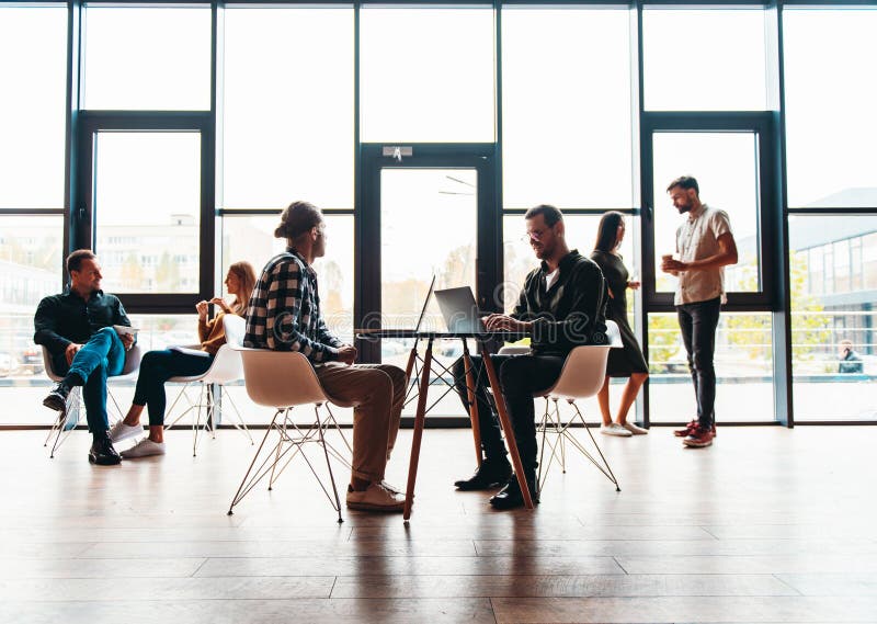 People Work Together in a Modern Office As Teamwork and Partner. Double ...