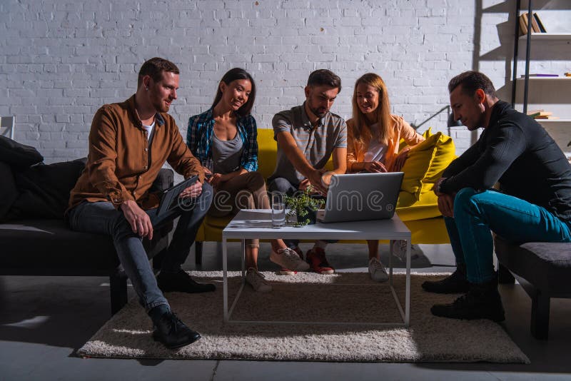 Business People that Work Together in Office with a Laptop Stock Image ...