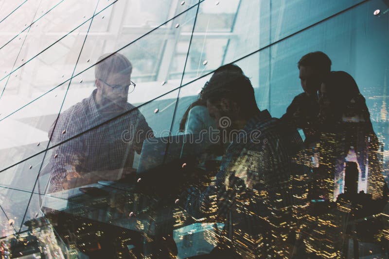 Businessmen that Work Together in Office with Network Connection Effect ...