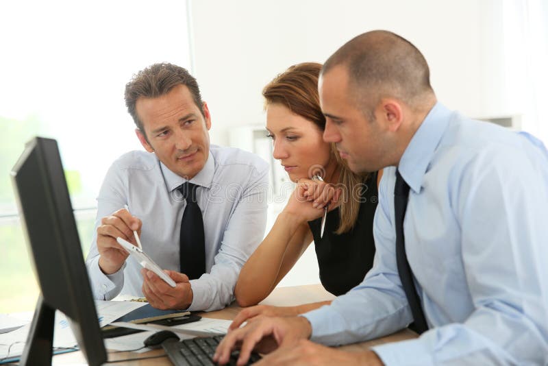 Business People Working on Computer Stock Photo - Image of smiling ...