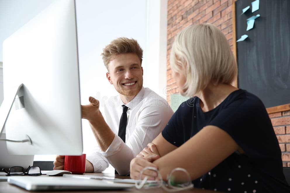 Business People Working on Computer at Table in Office Stock Image ...