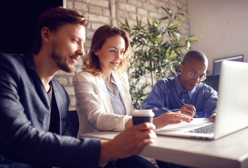 Business People Working at Desk on Laptop Stock Photo - Image of ...