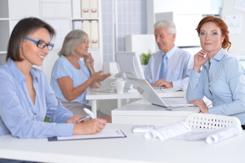 Business People Working at Desk in Office Stock Image - Image of ...