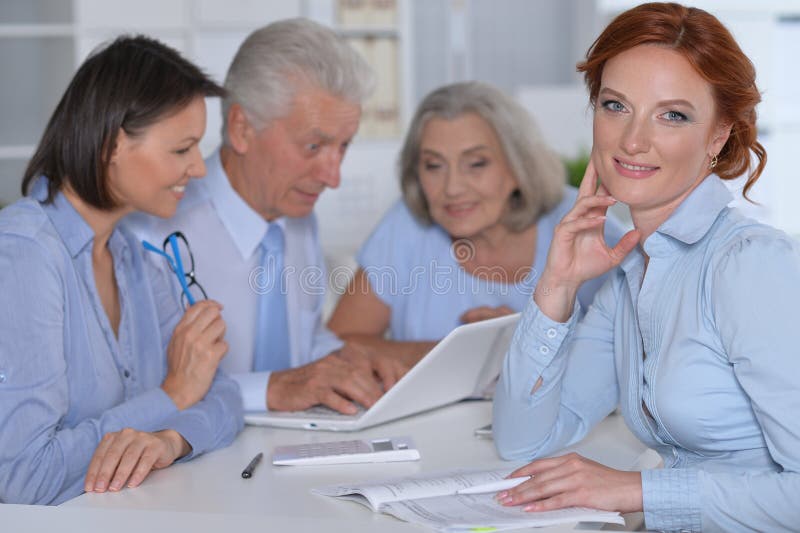 Business People Working at Desk in Office Stock Image - Image of female ...