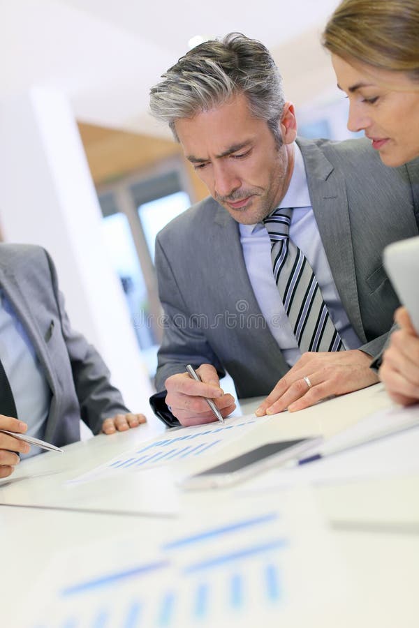 Business People Working on Financial Strategy Stock Photo - Image of ...