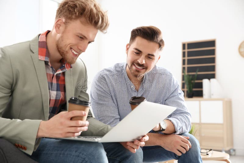 Business People Working on Laptop in Office Stock Photo - Image of ...