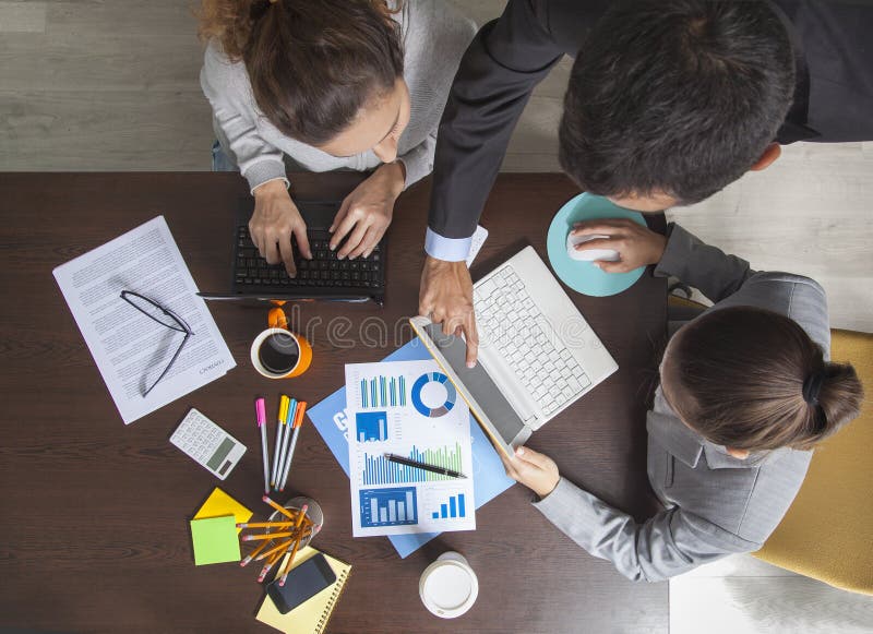 Business People Working on an Office Desk Stock Photo - Image of busy ...