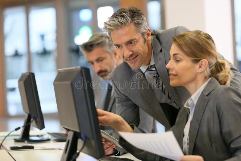 Business People Working at Office on Desktop Computer Stock Photo ...