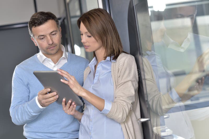 Business People Working on a Tablet Stock Photo - Image of women ...