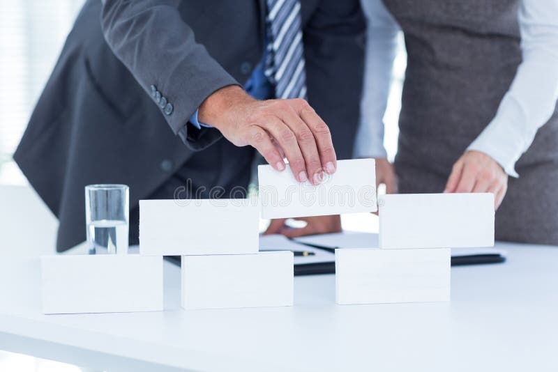 Business People Working Together and Building Structure Stock Image ...