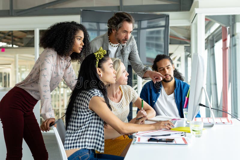 Business People Working Together on Computer at Conference Room in a ...