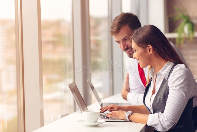 Young Business People Working Together on Computer Stock Photo - Image ...
