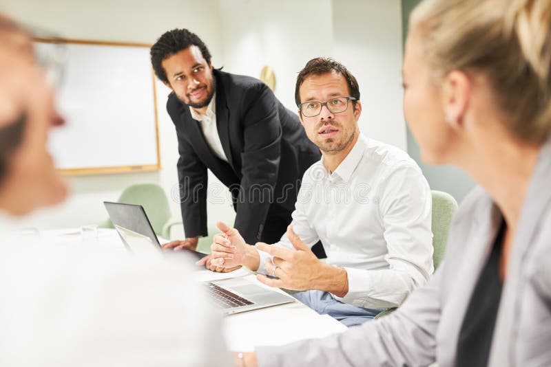 Business People Working Together on Laptop Computer Stock Image - Image ...