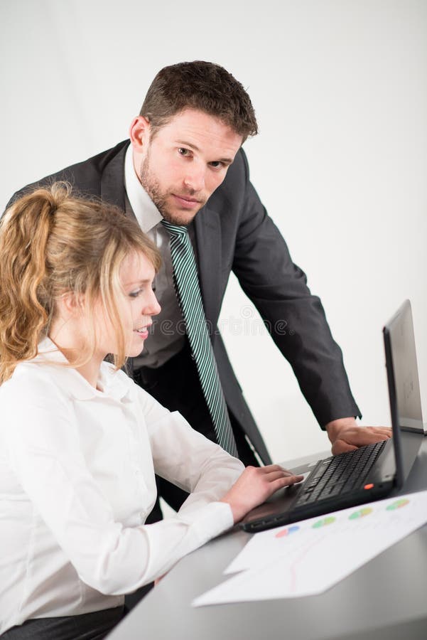 Business People Working Together in Office with Computer Stock Photo ...