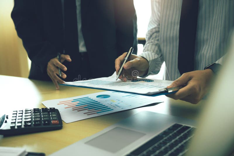 Business People Working Together at Office Room Table and Balancing ...