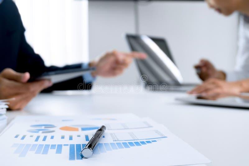 Business People Working Together and Using Digital Tablet at a ...