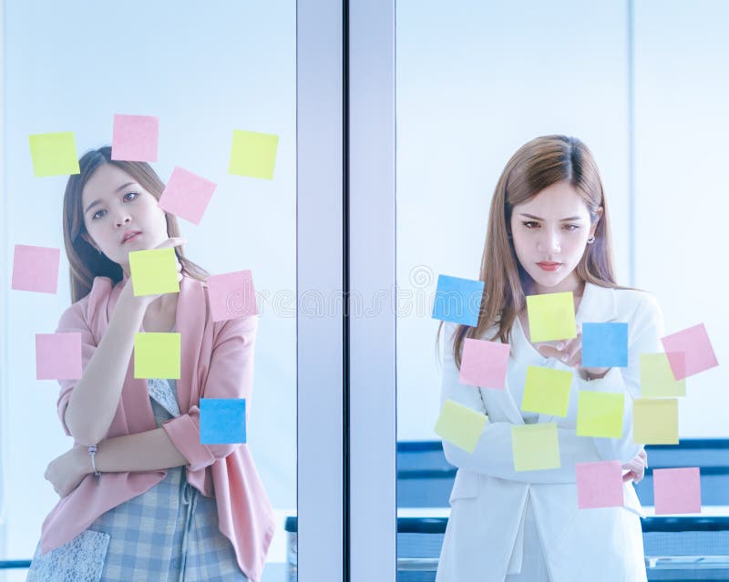 Business People Writing Idea on To Note Paper for Planning Stock Photo ...