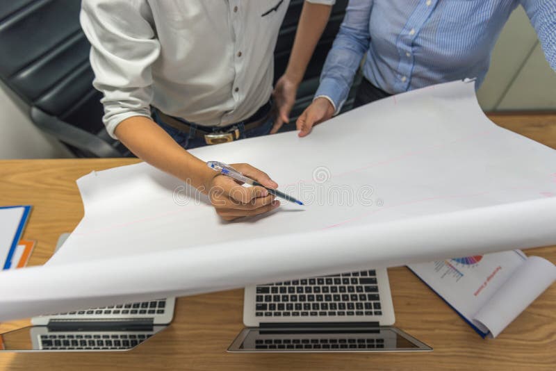 Business People Writing the Business Plan on Paper Stock Image - Image ...