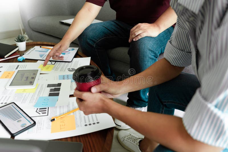 Business People Writing on Sticky Notes for Colleagues Thinking ...