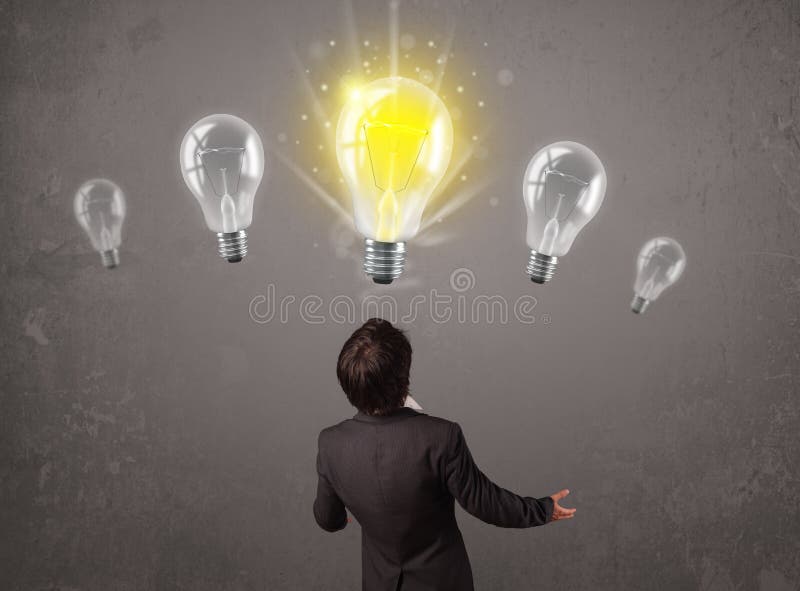 Business Person Having an Idea Light Bulb Concept Stock Photo - Image ...