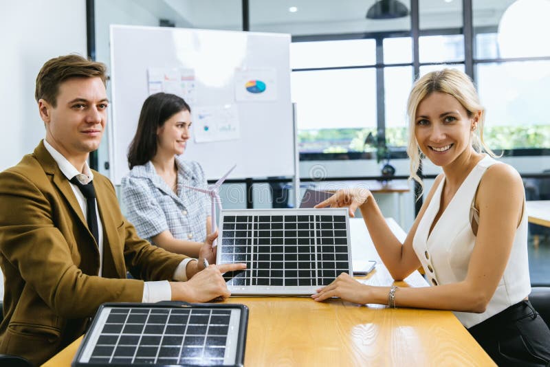 Business Person Meeting on Solar Cell Panel Technology. Business People ...