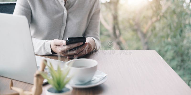 Business Person Reading Emails on Smartphone and Laptop Computer Screen ...
