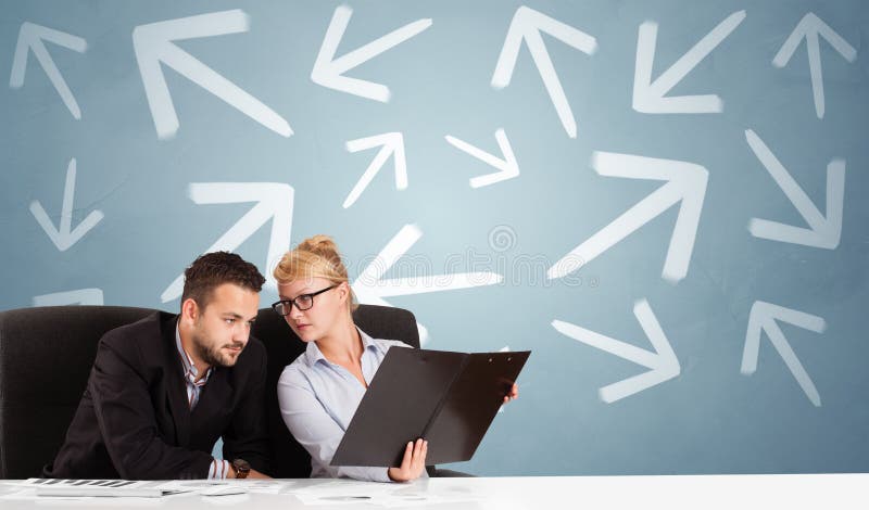 Business Person Sitting at Desk with Direction Concept Stock Photo ...
