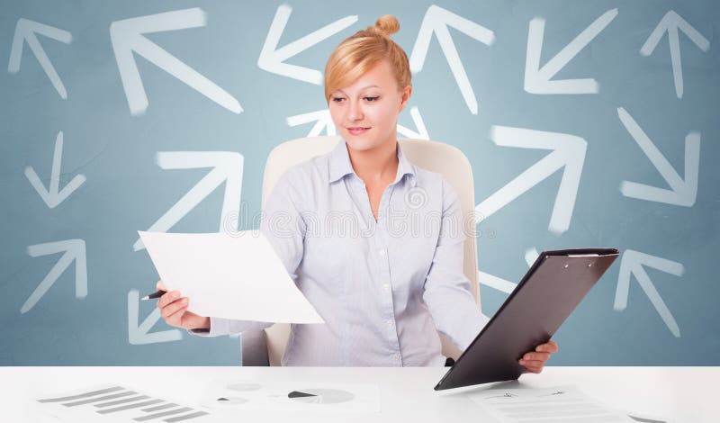 Business Person Sitting at Desk with Direction Concept Stock Image ...