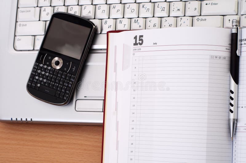 Business. Phone and Notepad on Laptop. Stock Image - Image of business ...