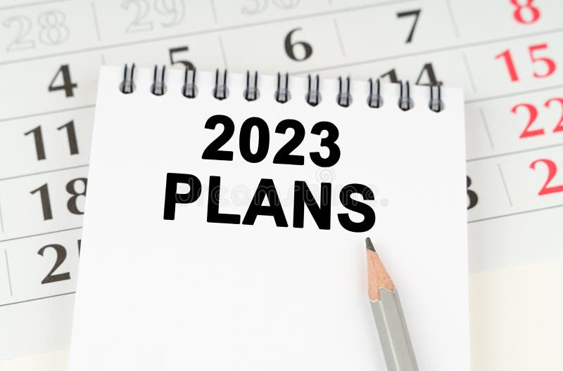 2023 Plans Symbol. White Paper with Words 2023 Plans, Clip on Wooden ...