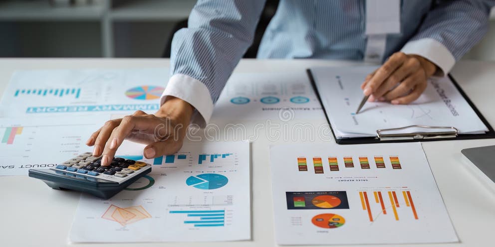 Business Professional Analysis Financial Data with Chart and Calculator ...