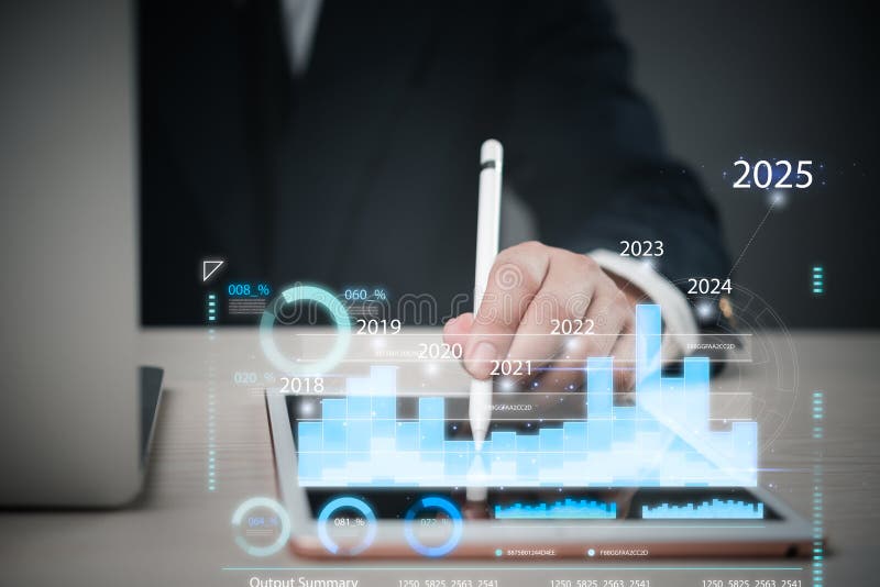 Business Professional Analyzing a Digital Graph with a Pen ...