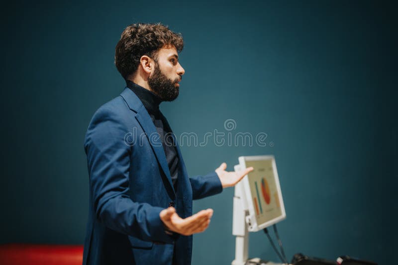 Business Professional Presenting Data Using Visual Aids during a Formal ...