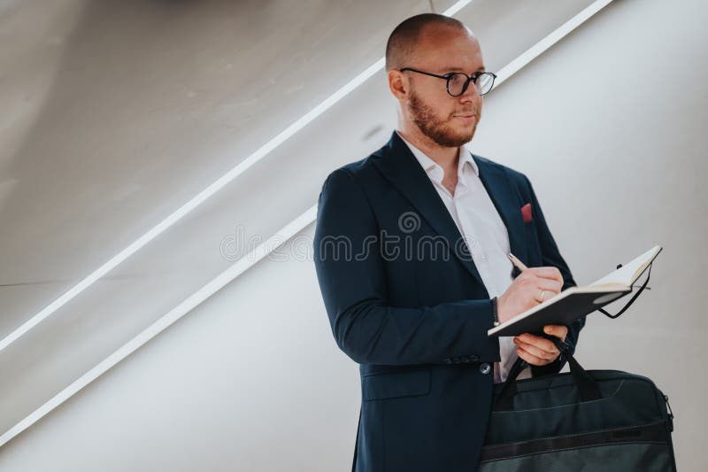 Business Professional Taking Notes in Modern Office at Night Stock ...