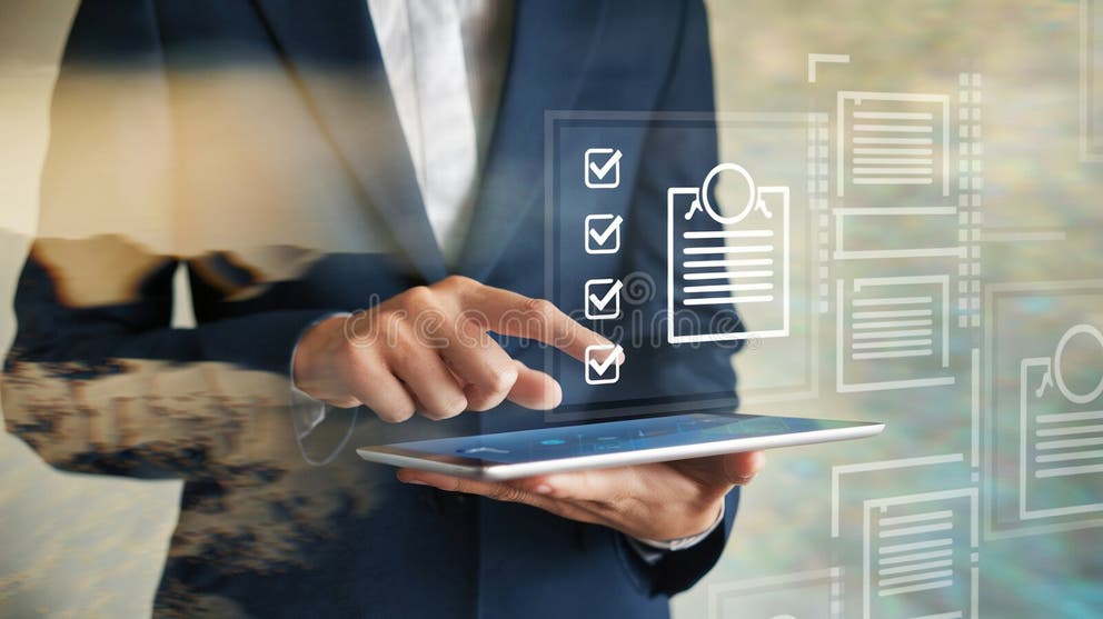 Business Professional Using Digital Tablet To Manage Documents and ...