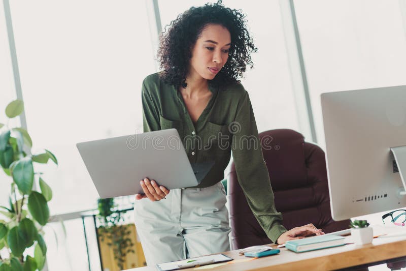 Young Professional Businesswoman Working on Her Computer in a Modern ...