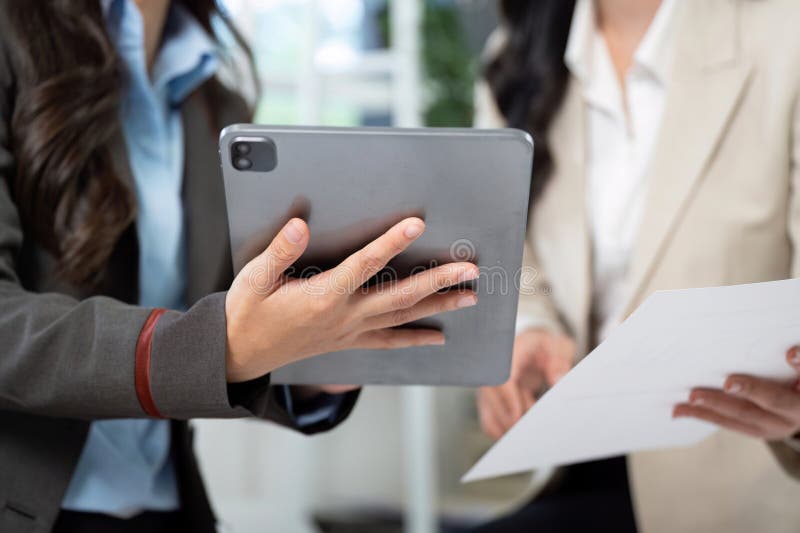 Digital Transformation in Business. Professionals Reviewing Data on a ...