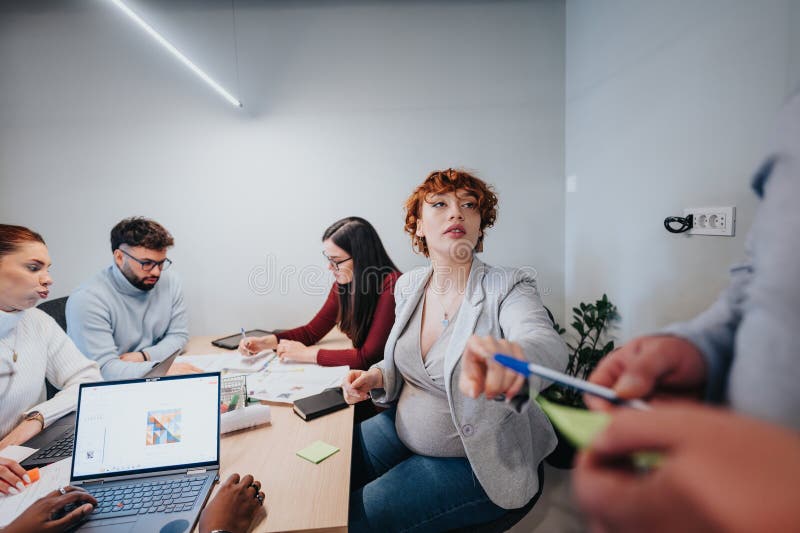 Business Professionals Collaborating in a Creative Office. Stock Image ...
