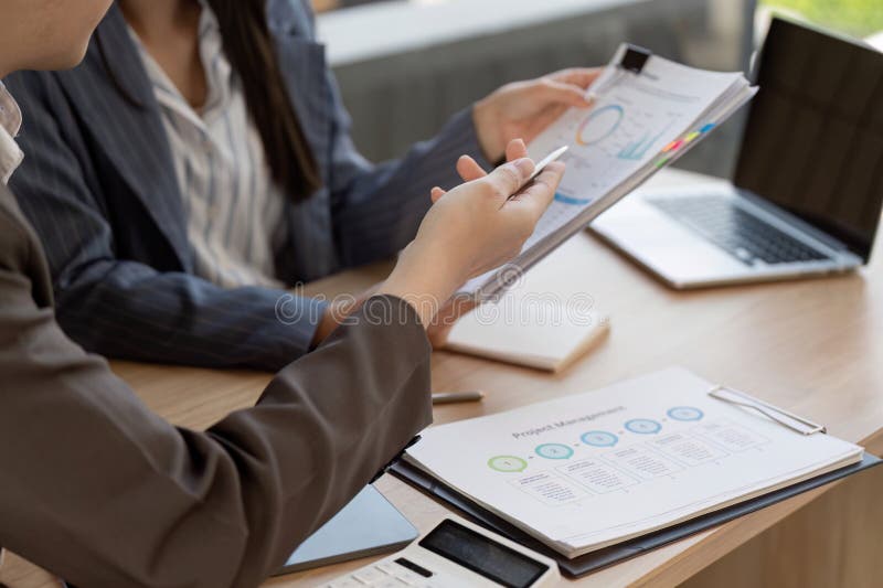 Business Professionals Collaborating on Financial Strategy and Project ...